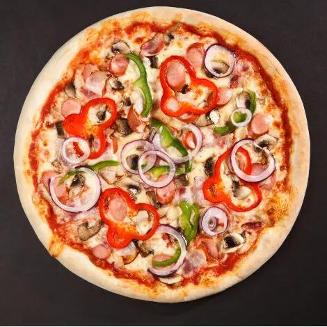 Pizza basque aux poivrons et fromage de brebis - Recette au fromage